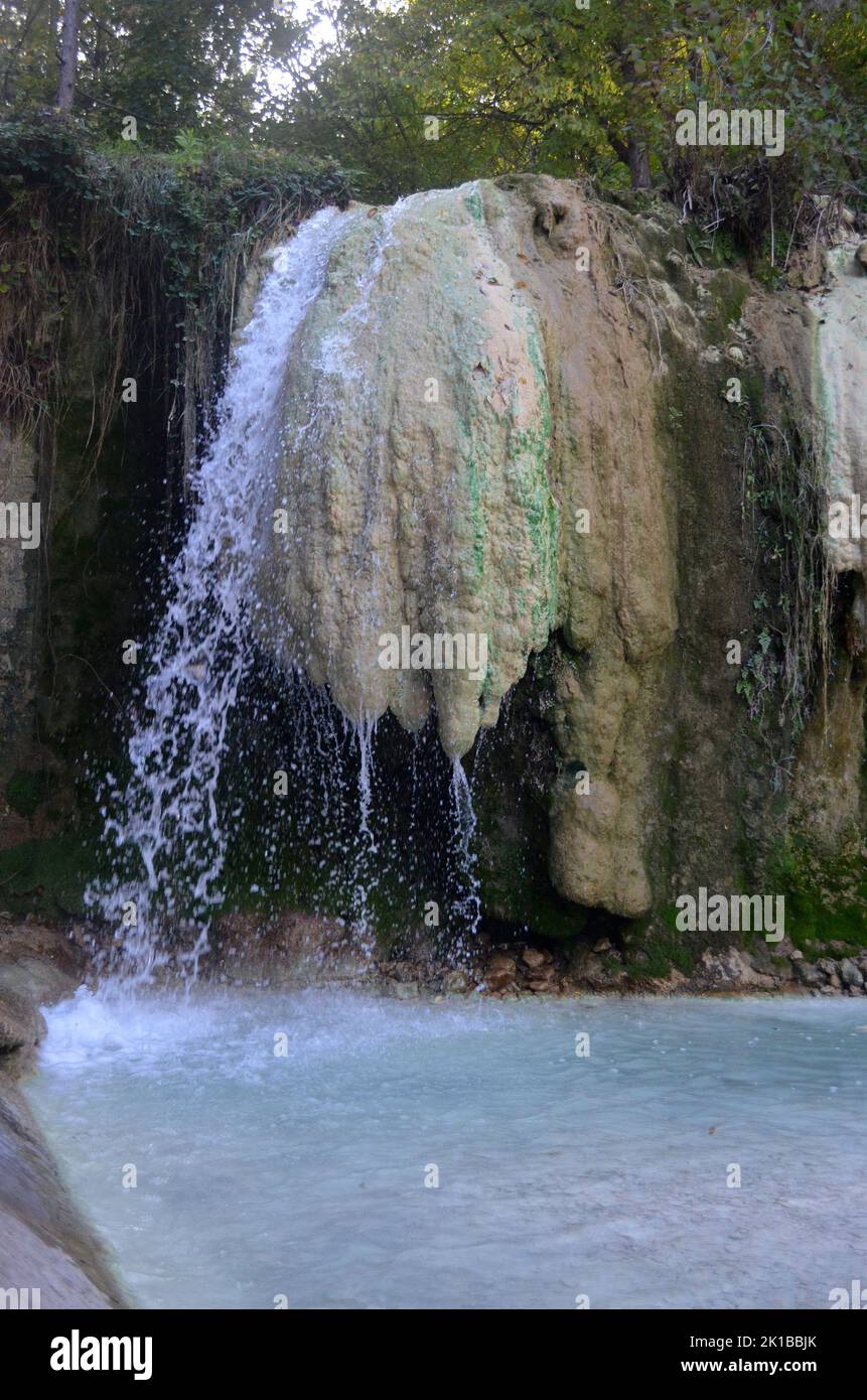 Waterflowing into a natural geothermal hot spring in Italy Stock Photo ...