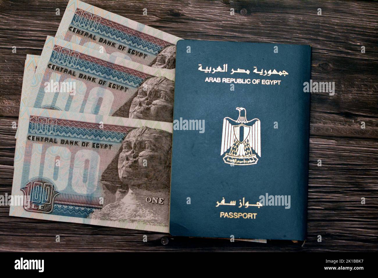 Egyptian passport with 100 EGP LE one hundred Egyptian pounds money ...