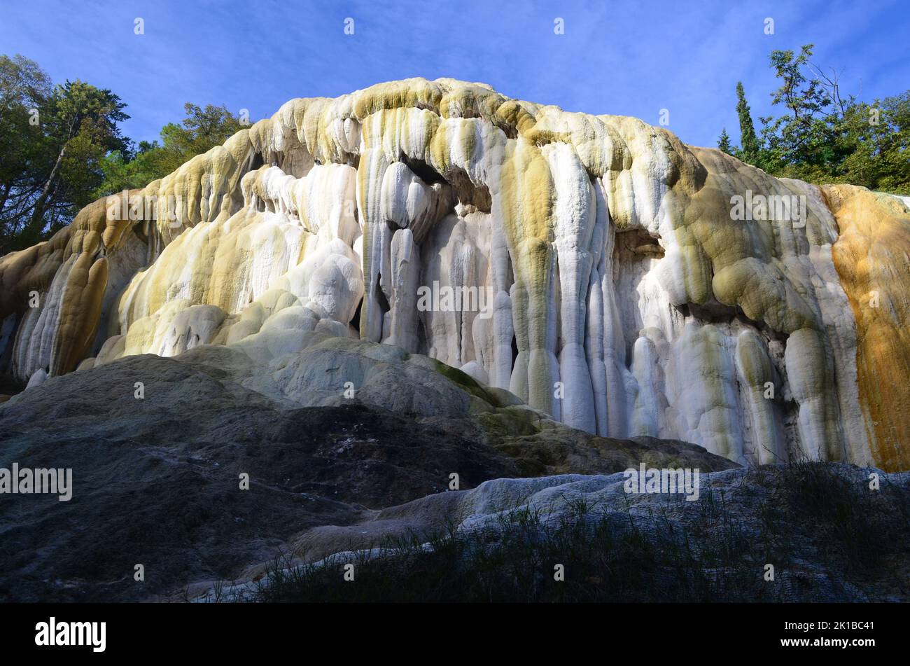 Wall of calcifications and mineral deposits at a geothermal hot spring ...