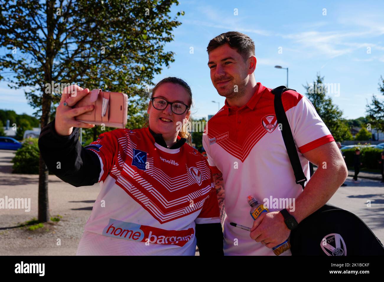 Mark Percival #4 of St Helens poses for a photo with fans before the ...