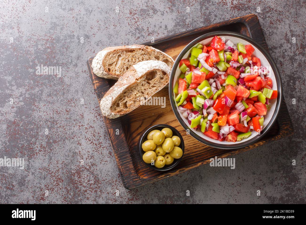 Trampo is a typical peppers tomatoes salad in Majorca Spain closeup on ...