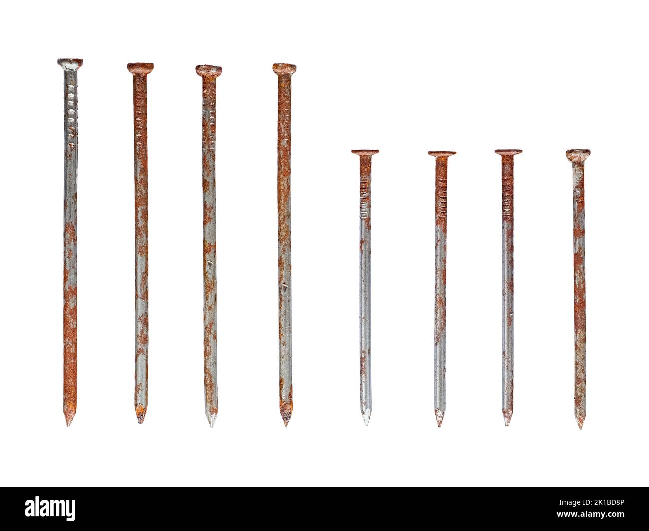 Straight old rusty nails half long and half short isolated on white ...