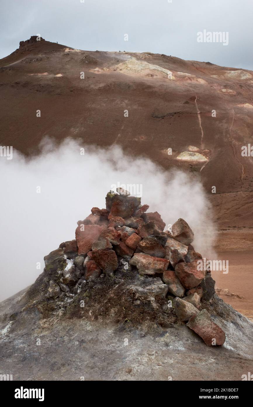 Fumarole with smoke at Namafjall Hverir geothermal area, Iceland Stock ...
