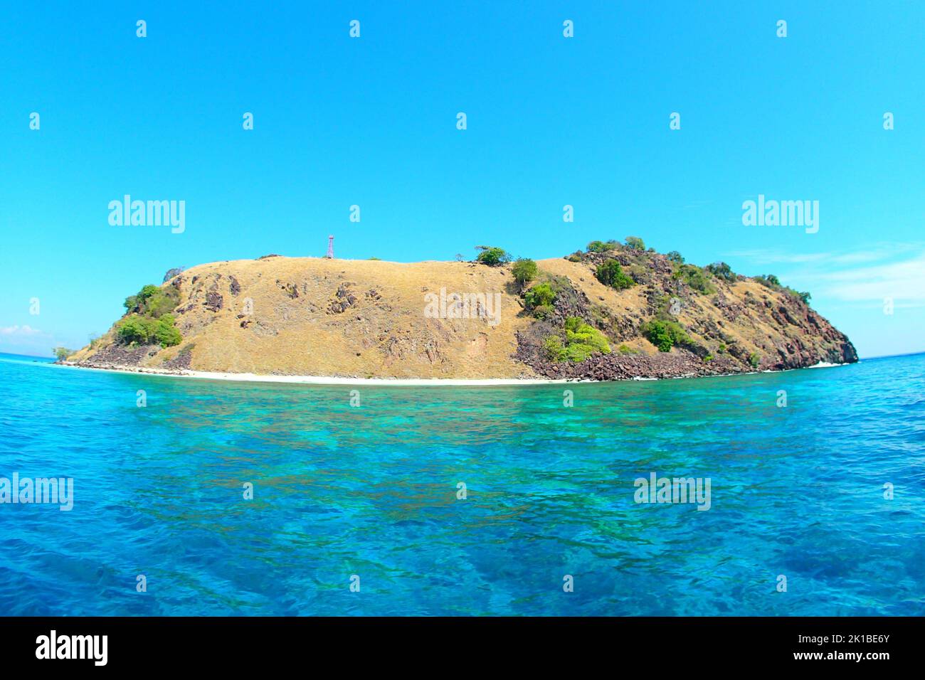 A beautiful island surrounded by azure water Stock Photo - Alamy