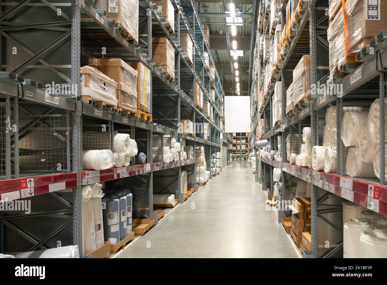Goods and items on the shelves of a large modern warehouse Stock Photo ...