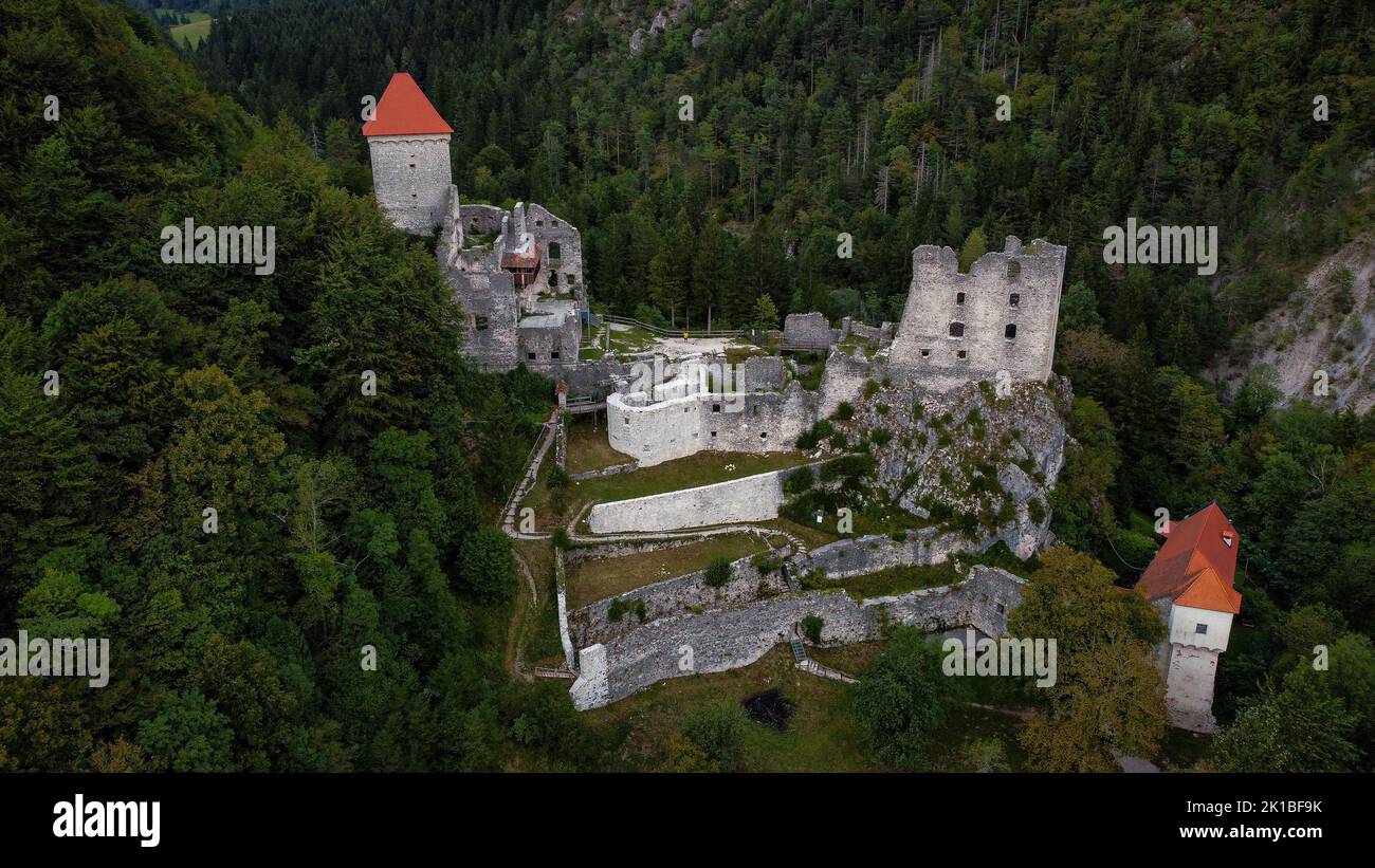 A bird's eye view of the Grad Kamen castle surrounded by trees Stock ...