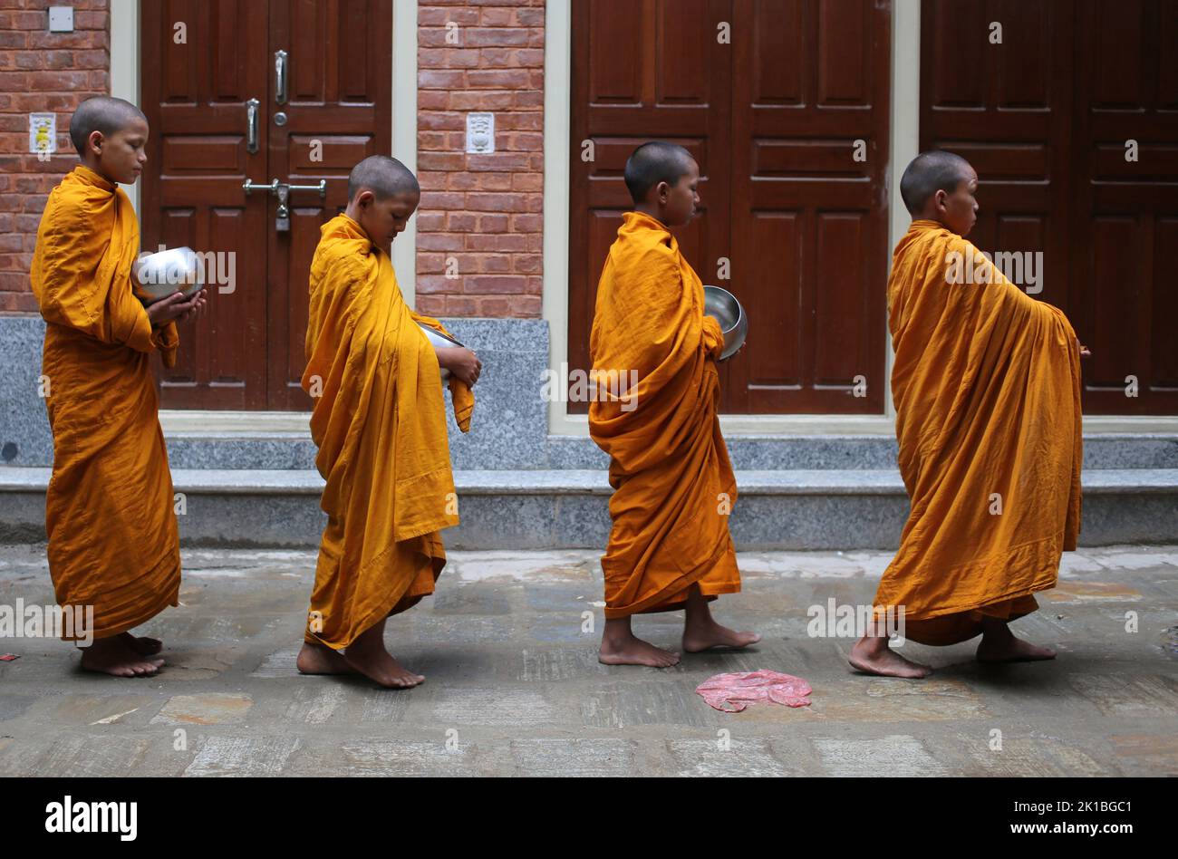 Kathmandu, Nepal. 17th Sep, 2022. Buddhist monks walk around the ...