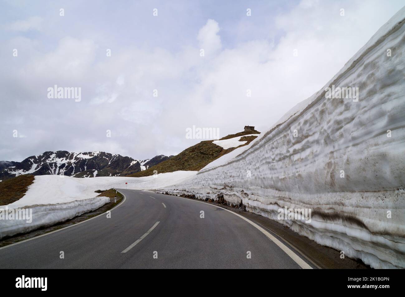 Scenic snowy Timmelsjoch mountain pass connecting Oetztal valley in ...