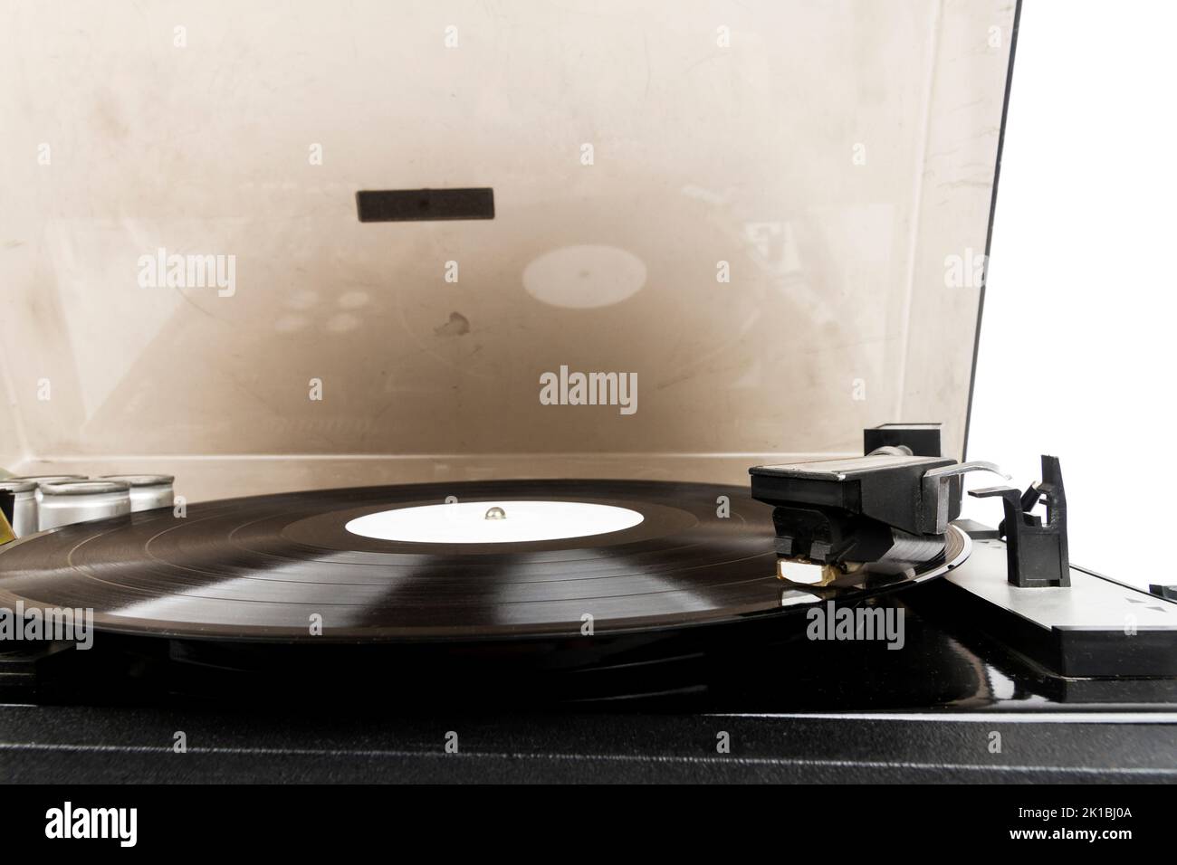 Vintage turntable record player with black vinyl isolated on white ...