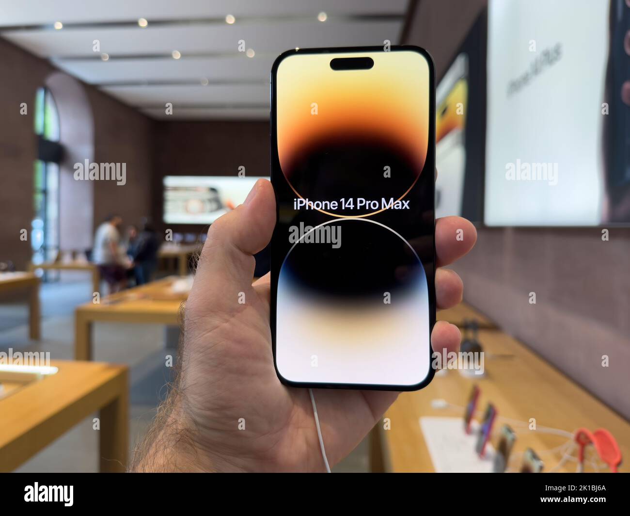 Iphone 14 in hand hi-res stock photography and images - Alamy