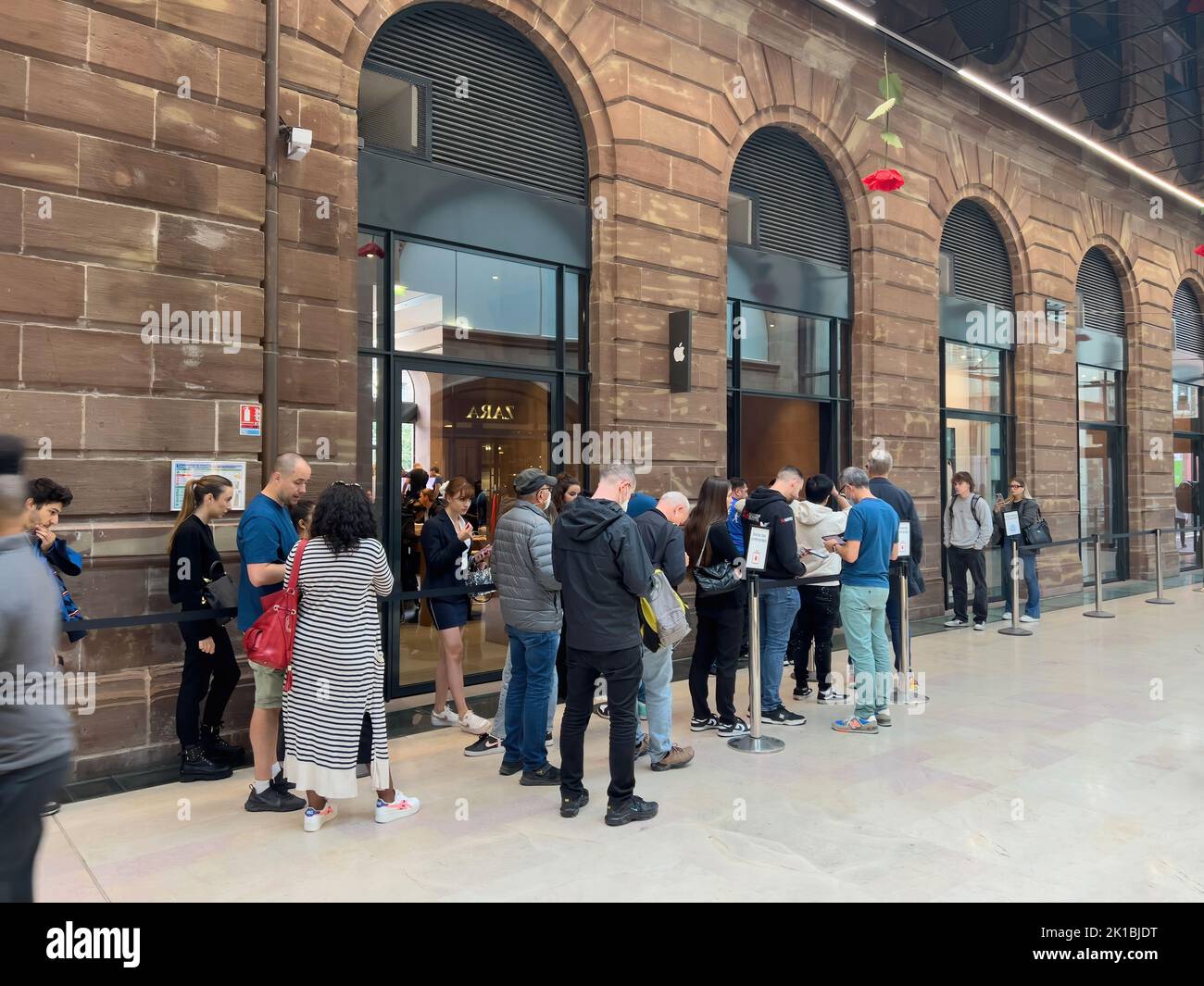 Paris, France - Sep 16, 2022: Group of adult and young people in line ...