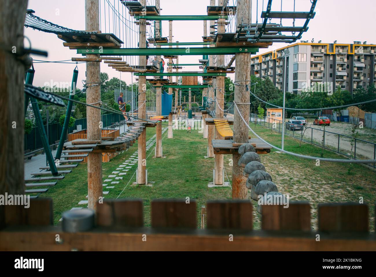 Big adventure park filled with people standing on different levels ...