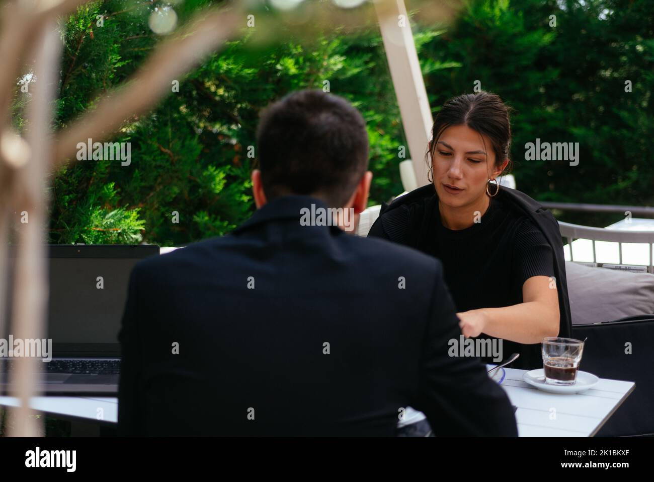 An attractive businesswoman and her male colleague just finished with ...