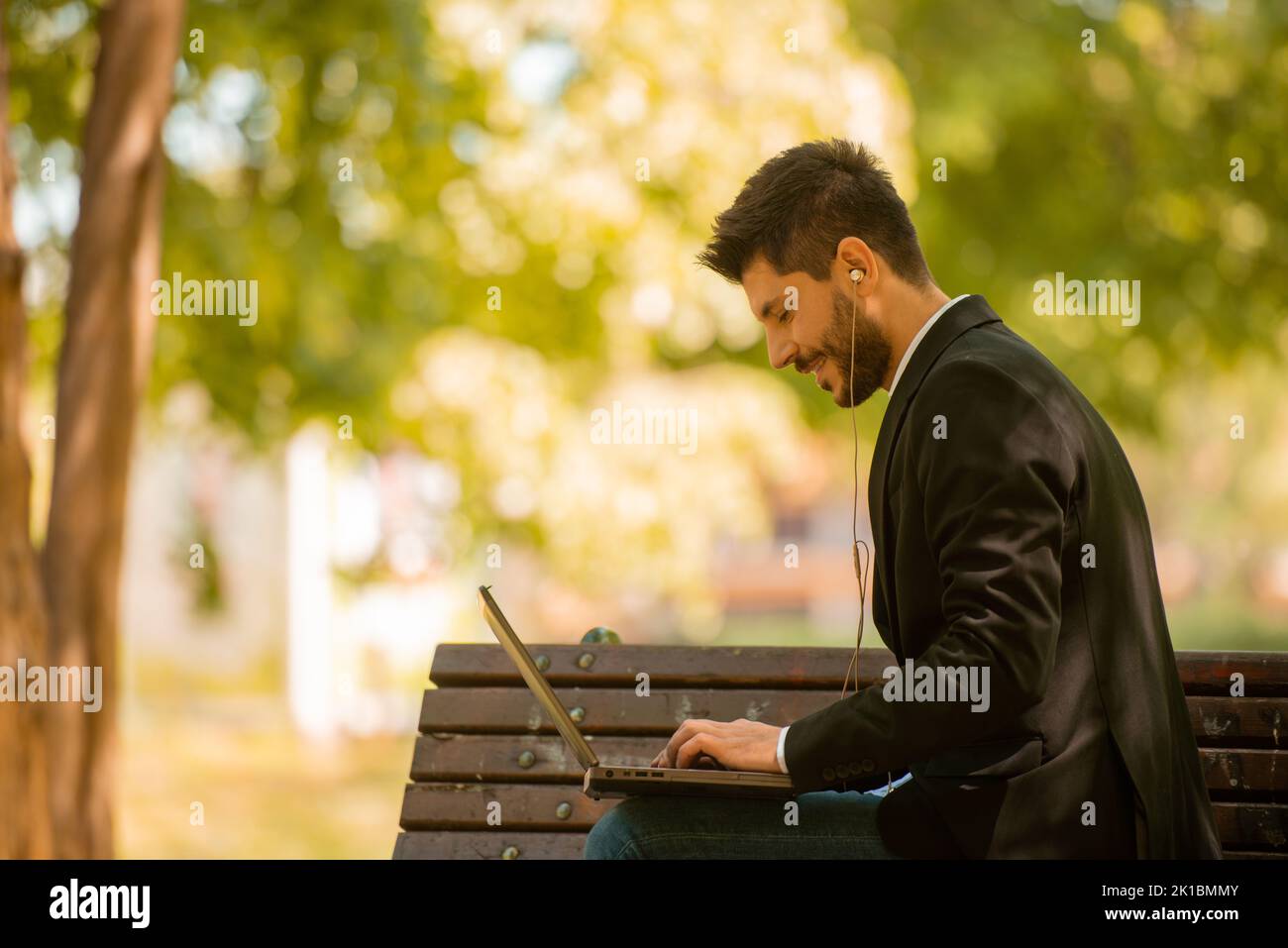 Close up of a businessman talking on video call on his laptop while ...