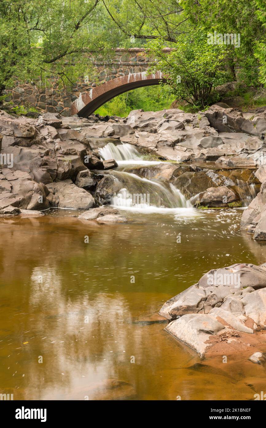 Amity Creek and Stone Arch Bridge In Summer Stock Photo - Alamy