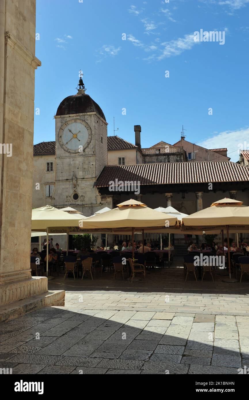 The Trogir Loggia and Clock Tower restaurant. Vertical photo with copy ...