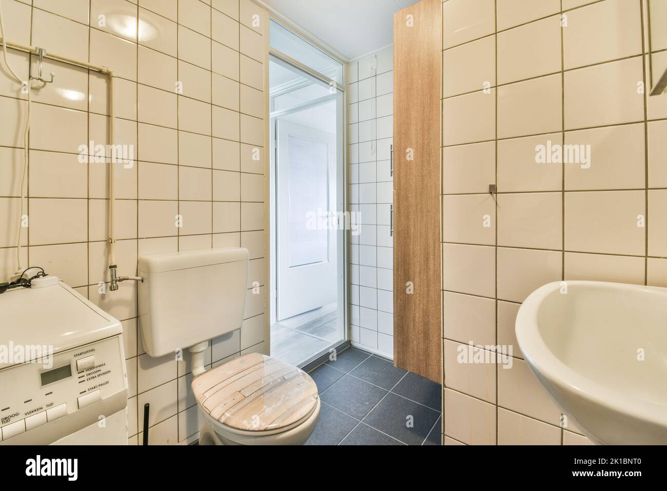 shower tap and wall hung toilet in modern restroom at home Stock Photo ...