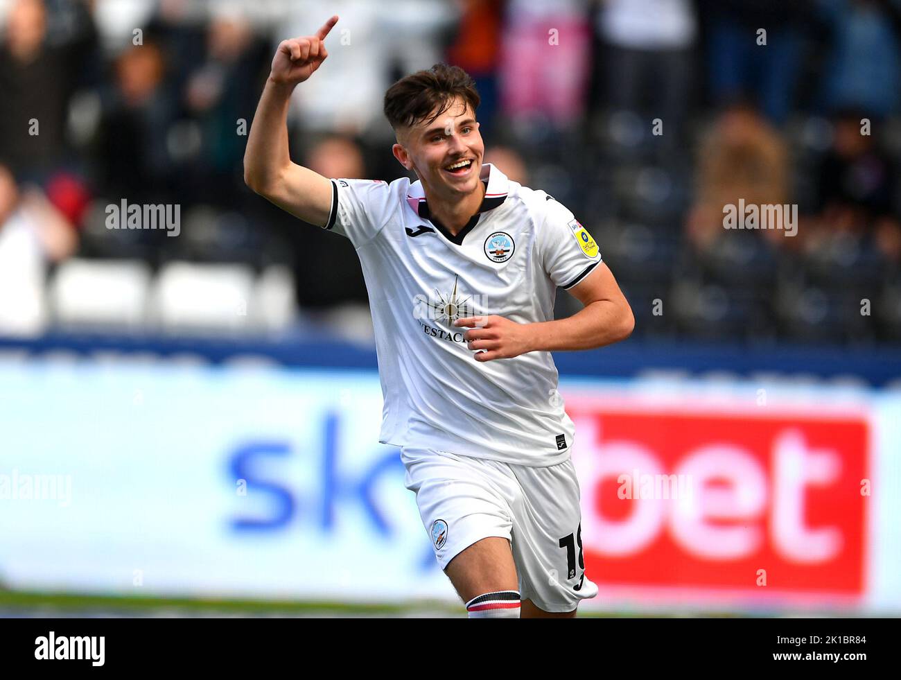 Swansea City's Luke Cundle celebrates scoring their side's second goal ...