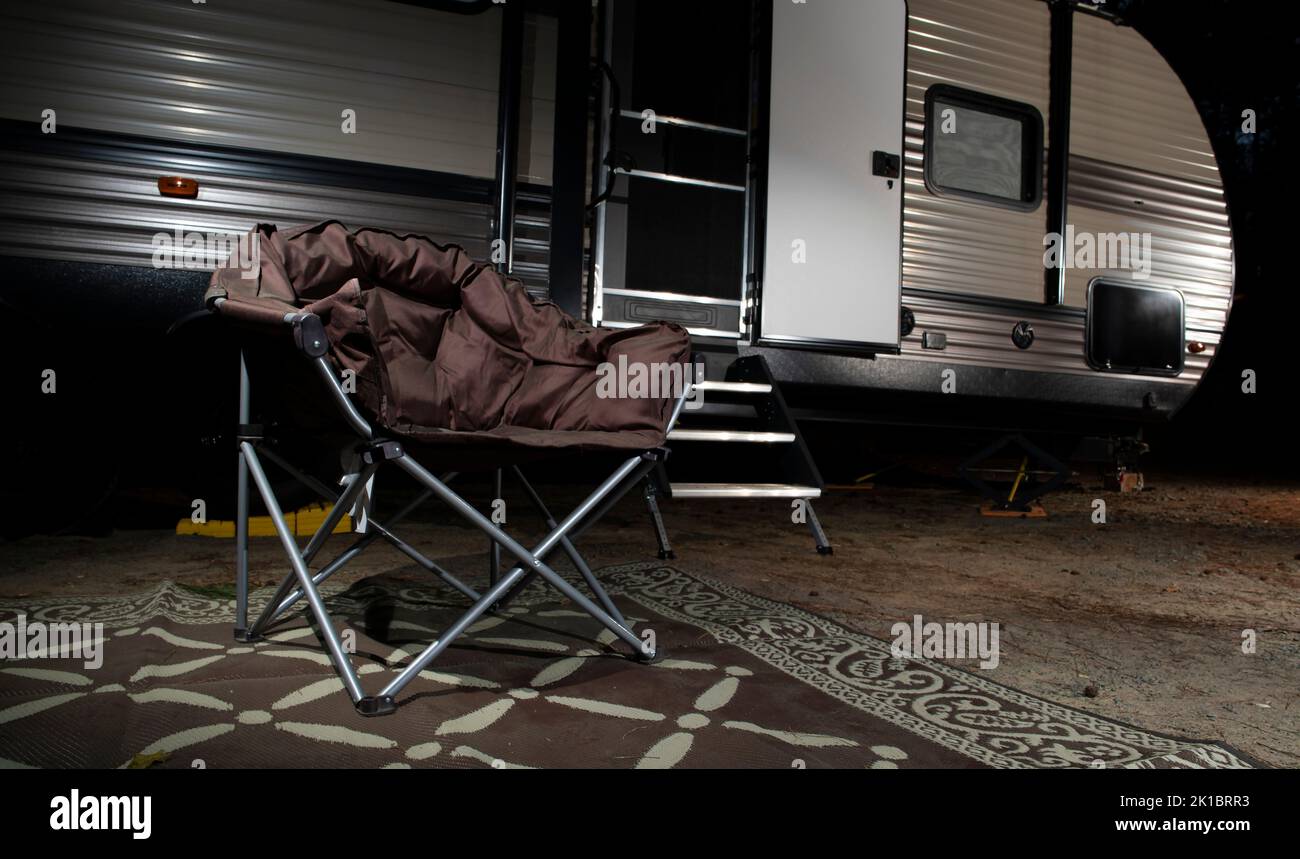 Empty campsite with travel trailer behind at night at Jordan Lake Stock ...