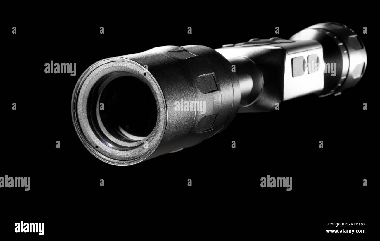 Night vision optic for a gun on a black background Stock Photo - Alamy
