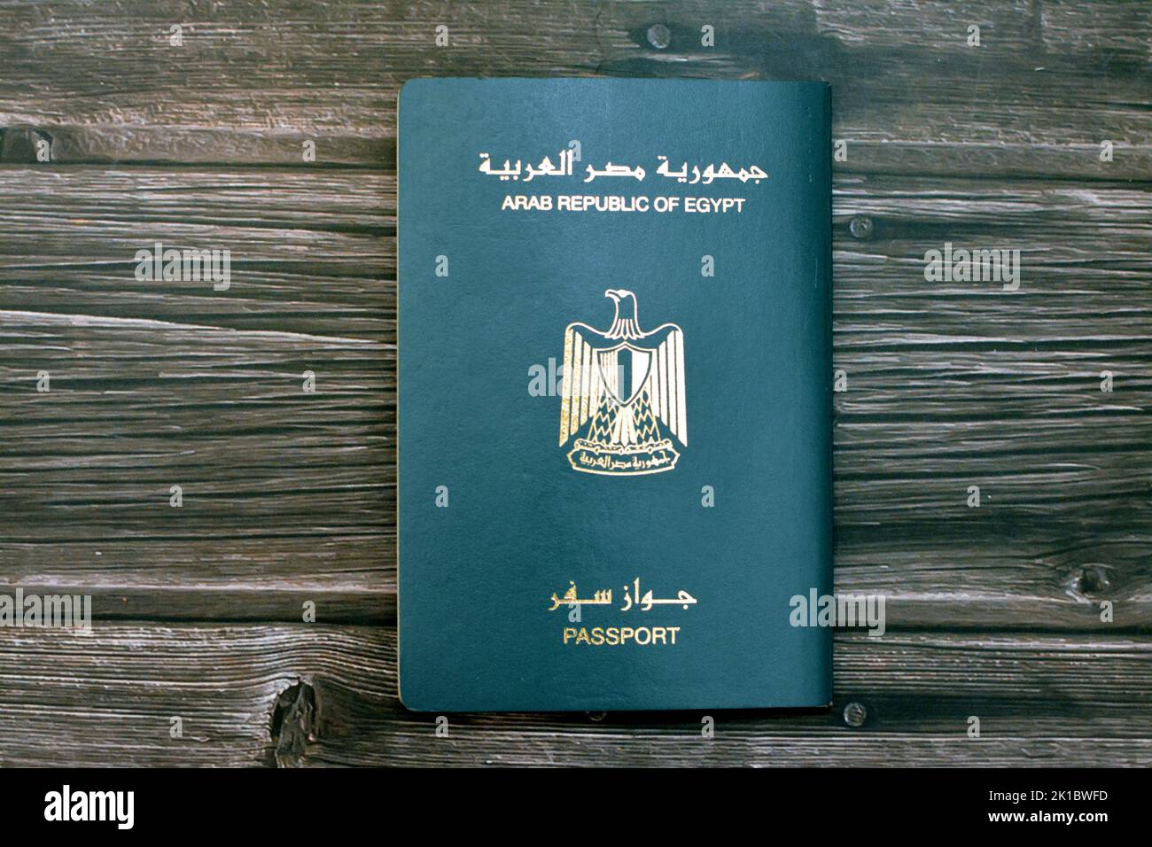 Egyptian passport isolated on wooden background, Arab republic of Egypt ...