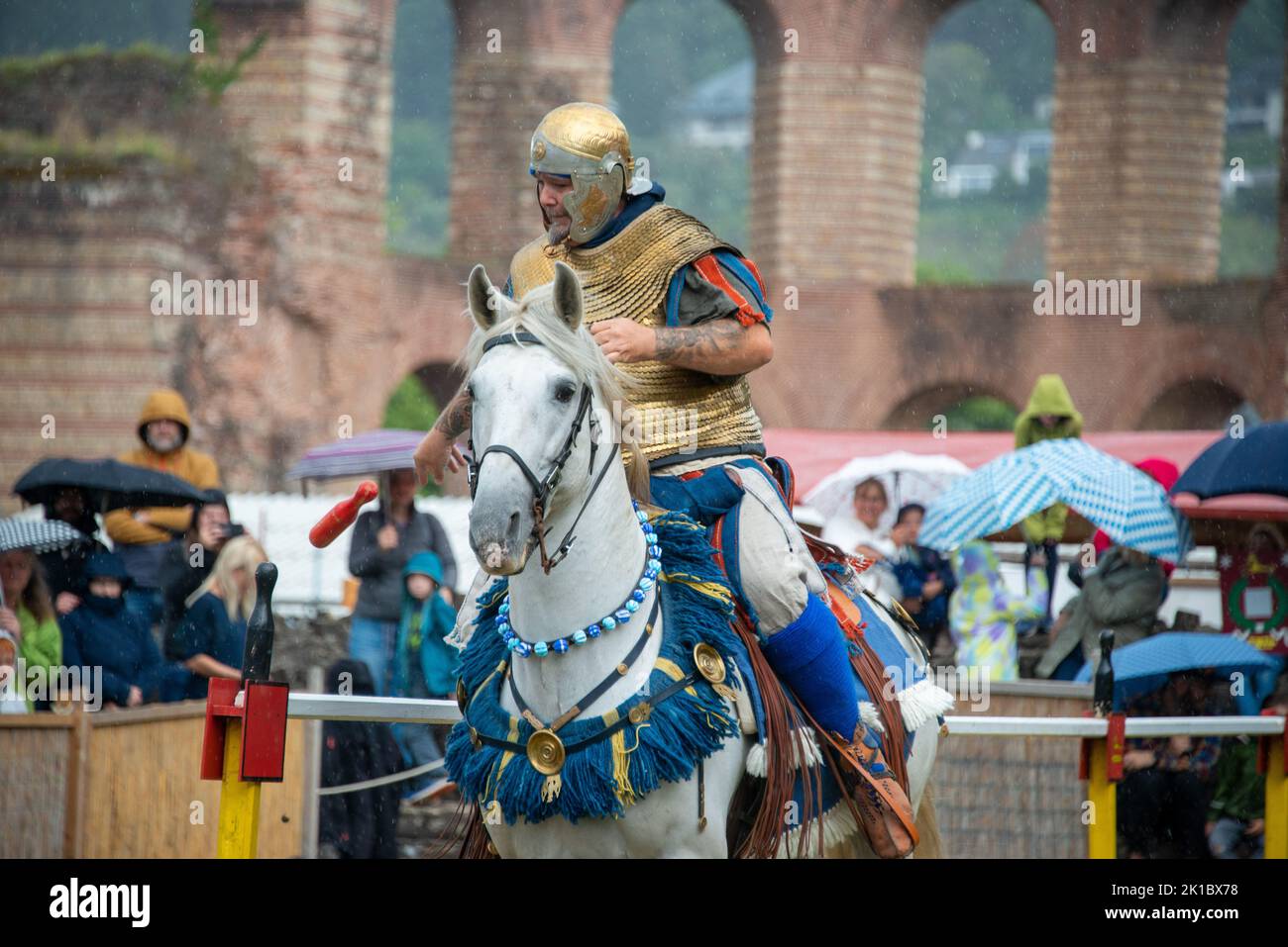 Trier, Germany. 17th Sep, 2022. A performer of a Roman horseman shows ...