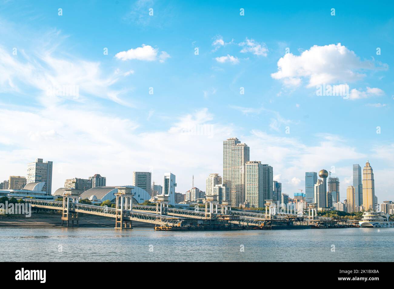 A view of the Yangtze River and the Wuhan skyline in the background ...