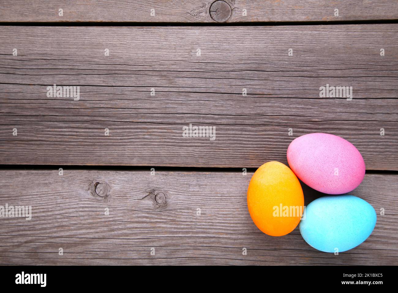 Colorful easter eggs on a grey background Stock Photo - Alamy