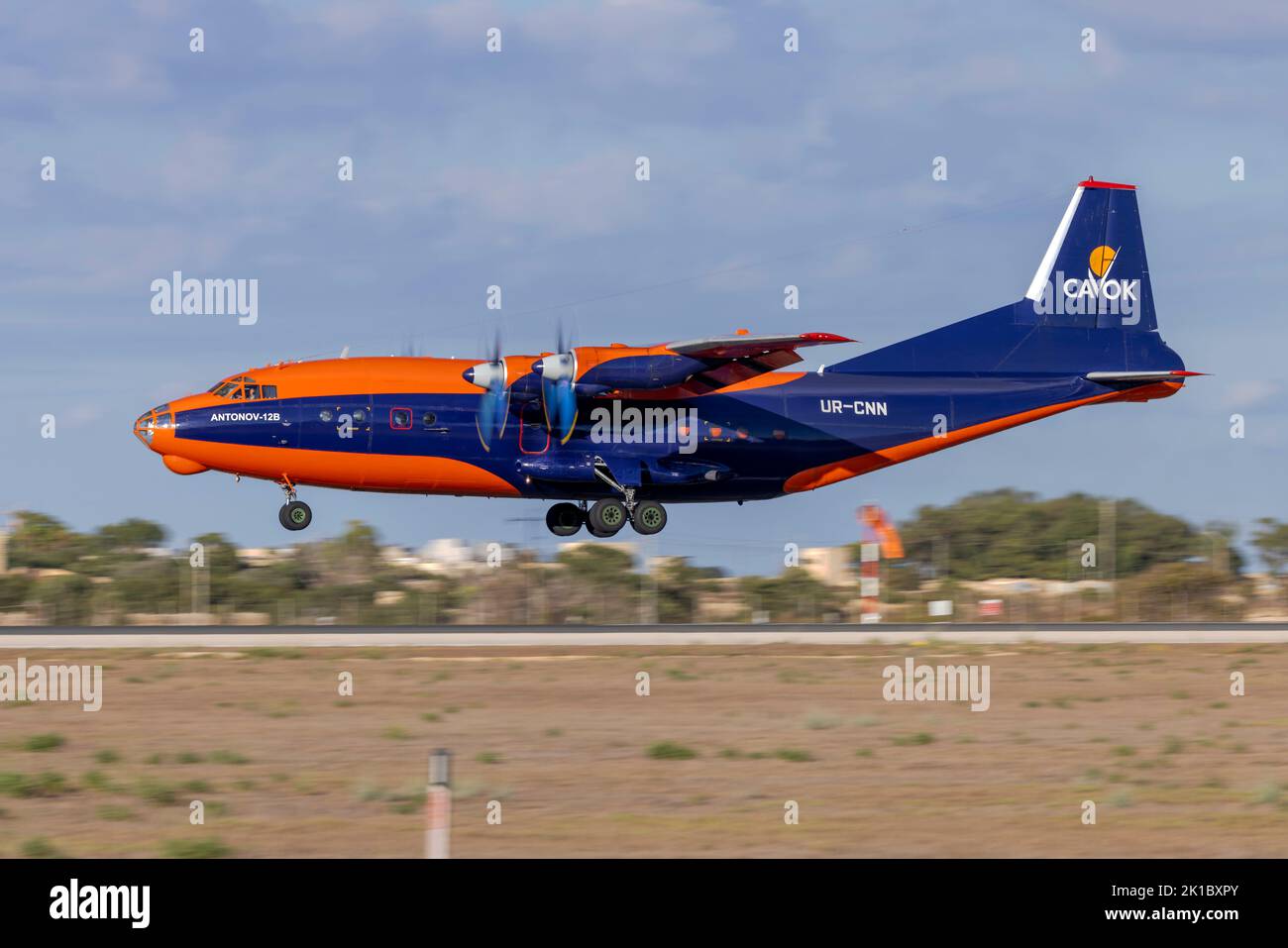 Cavok Air Antonov An-12BK (REG: UR-CNN) landing low on runway 31 Stock ...