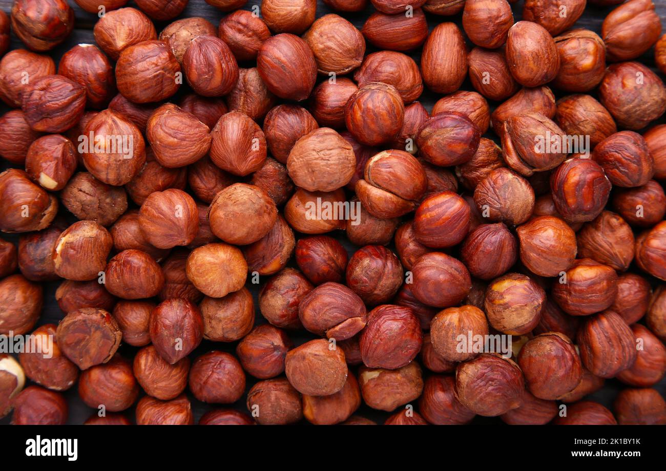 Hazelnut Background. Heap of peeled hazelnuts Stock Photo - Alamy