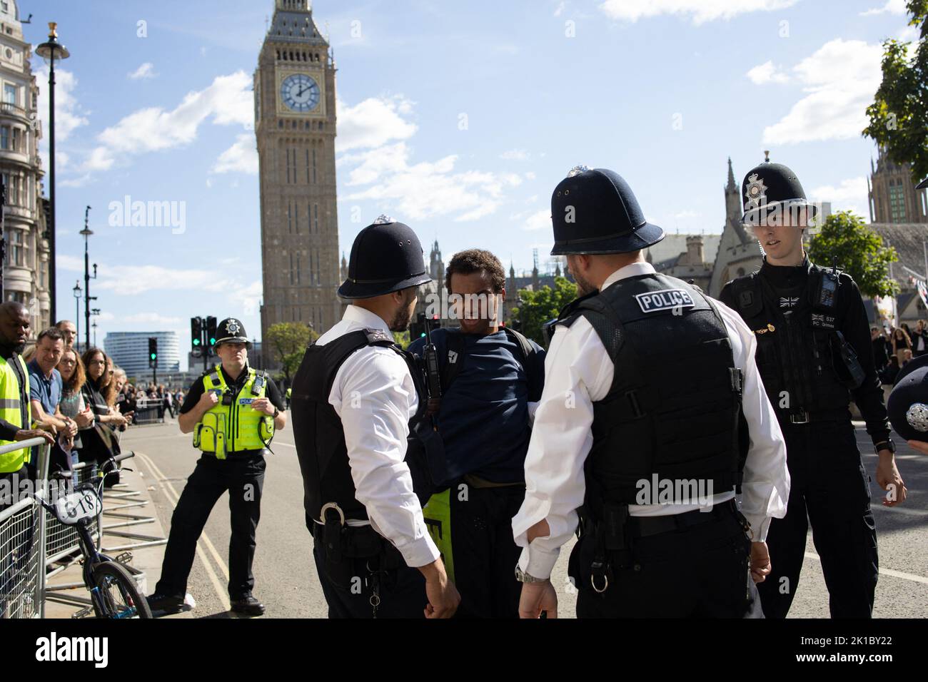 London, UK. 17th Sep, 2022. British police officers arrest a man who ...