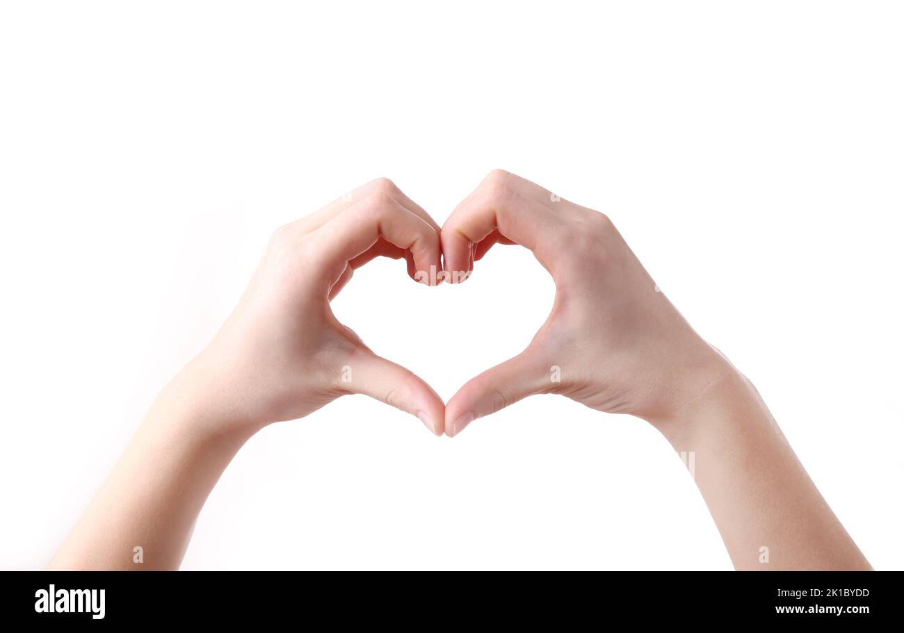 Female hands in heart shape isolated on a white background Stock Photo ...