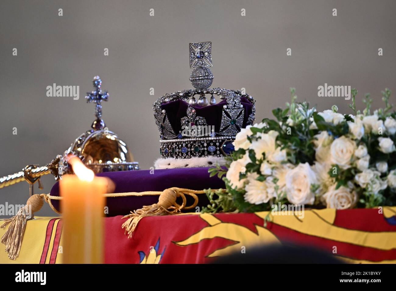 The coffin of Queen Elizabeth II, draped in the Royal Standard with the ...