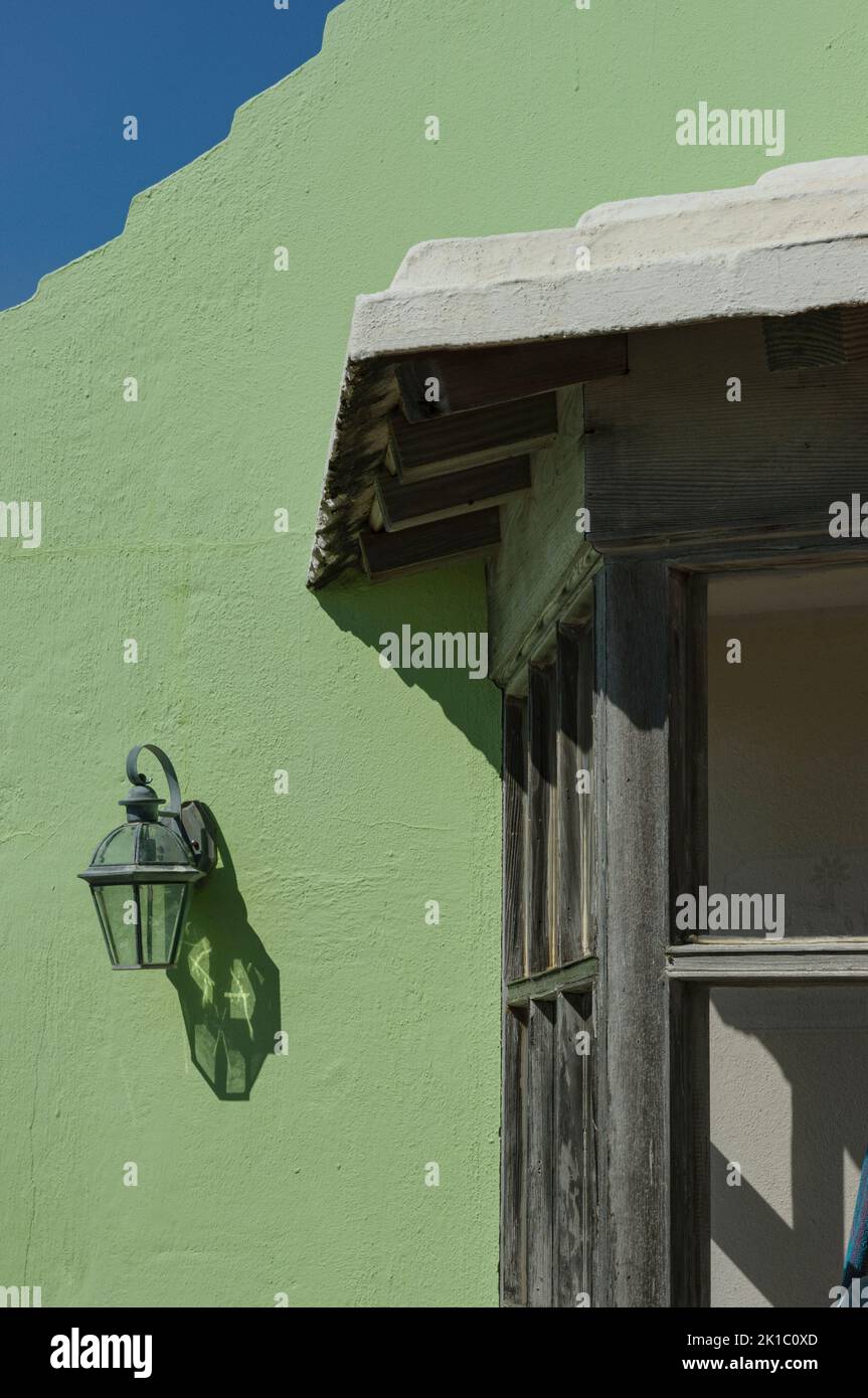 Bermuda Architecture Pastel Green House With Wood Entryway & Wall ...