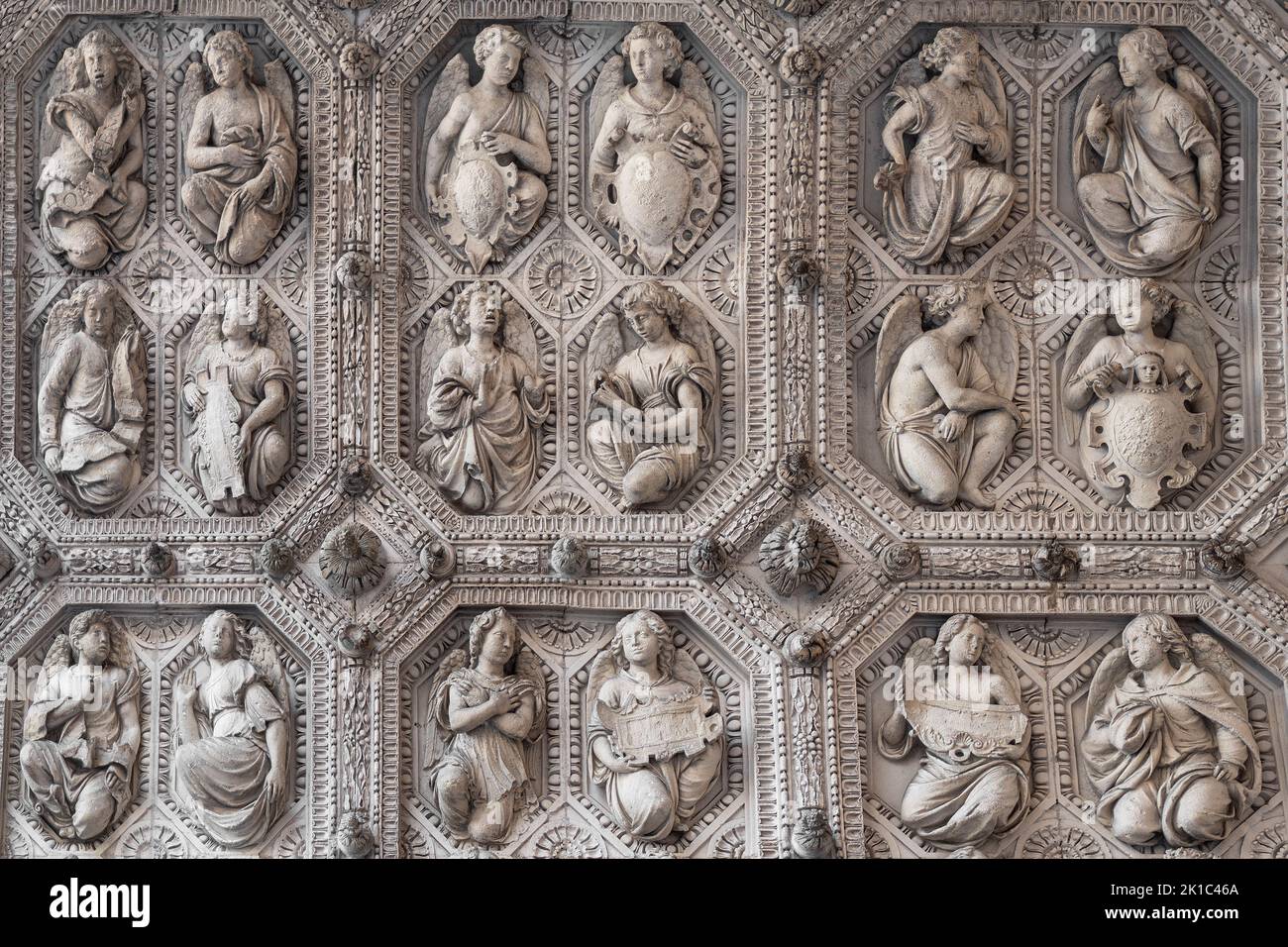 Detail of the religious stone sculptures on the portal of Dijon ...
