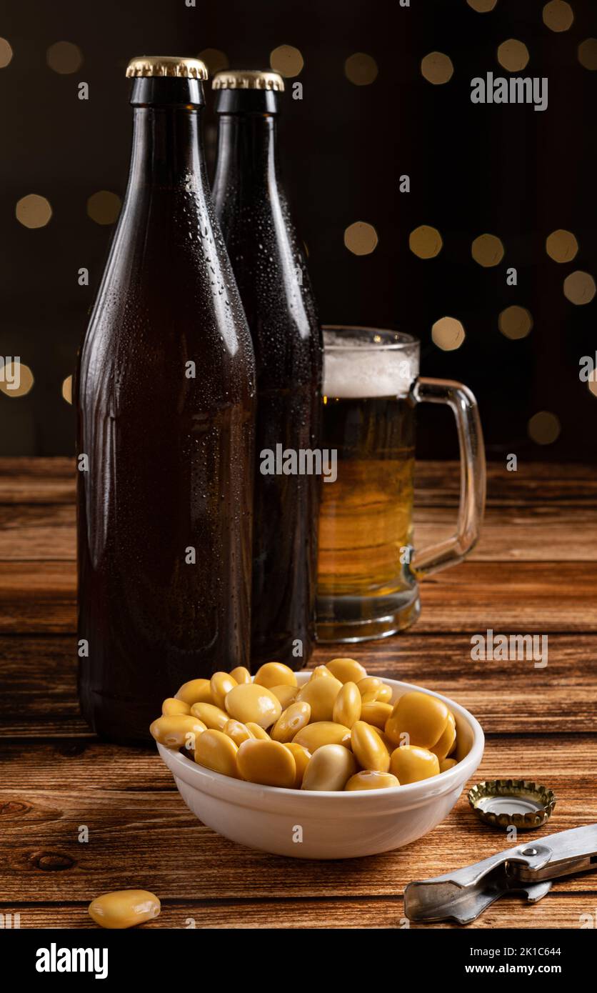salted Lupin Beans with beer on table with copy space Stock Photo - Alamy