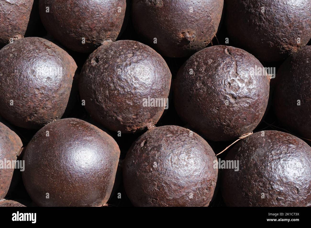 Antique rusty cannon balls, pattern, closeup, ancient iron cannonball ...