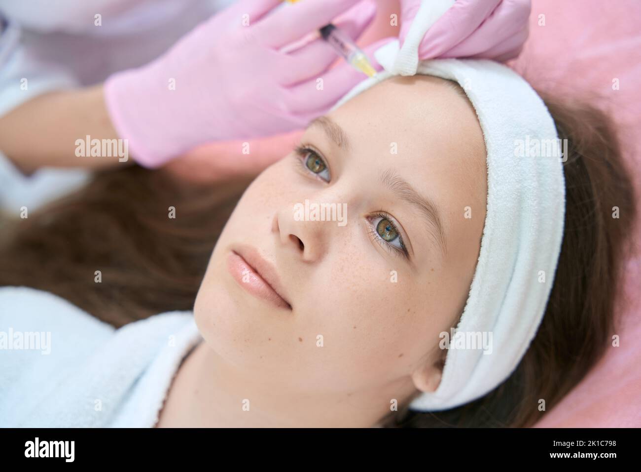 Close-up face of girl getting injection for acne treatment Stock Photo ...