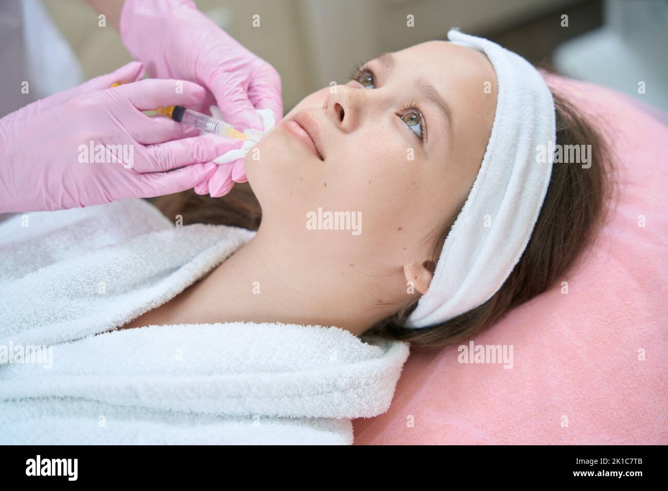 Woman hands give beautiful girl injection for treatment of acne Stock ...