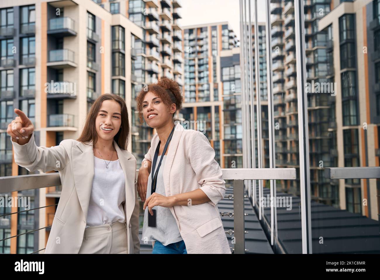 Coworker stand hi-res stock photography and images - Alamy