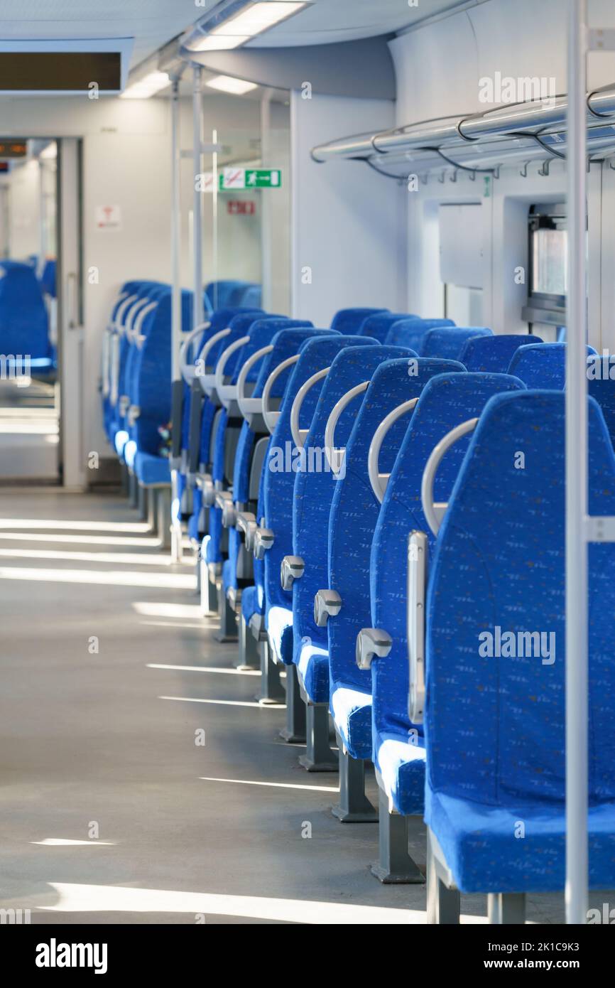 Interior of modern passenger high-speed express train, row of empty ...