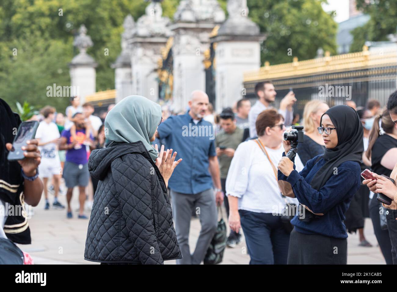 London, UK - September 11 2022: People mourning outside Buckingham ...