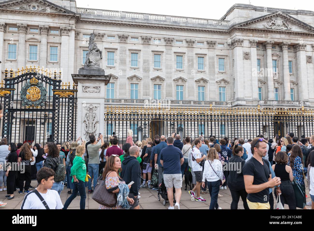 London, UK - September 11 2022: People mourning outside Buckingham Palace on the announcement of ...