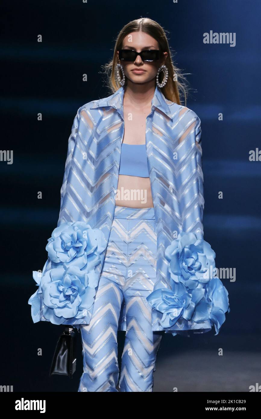 Madrid, Spain. 17th Sep, 2022. A model walks the runway wearing a ...