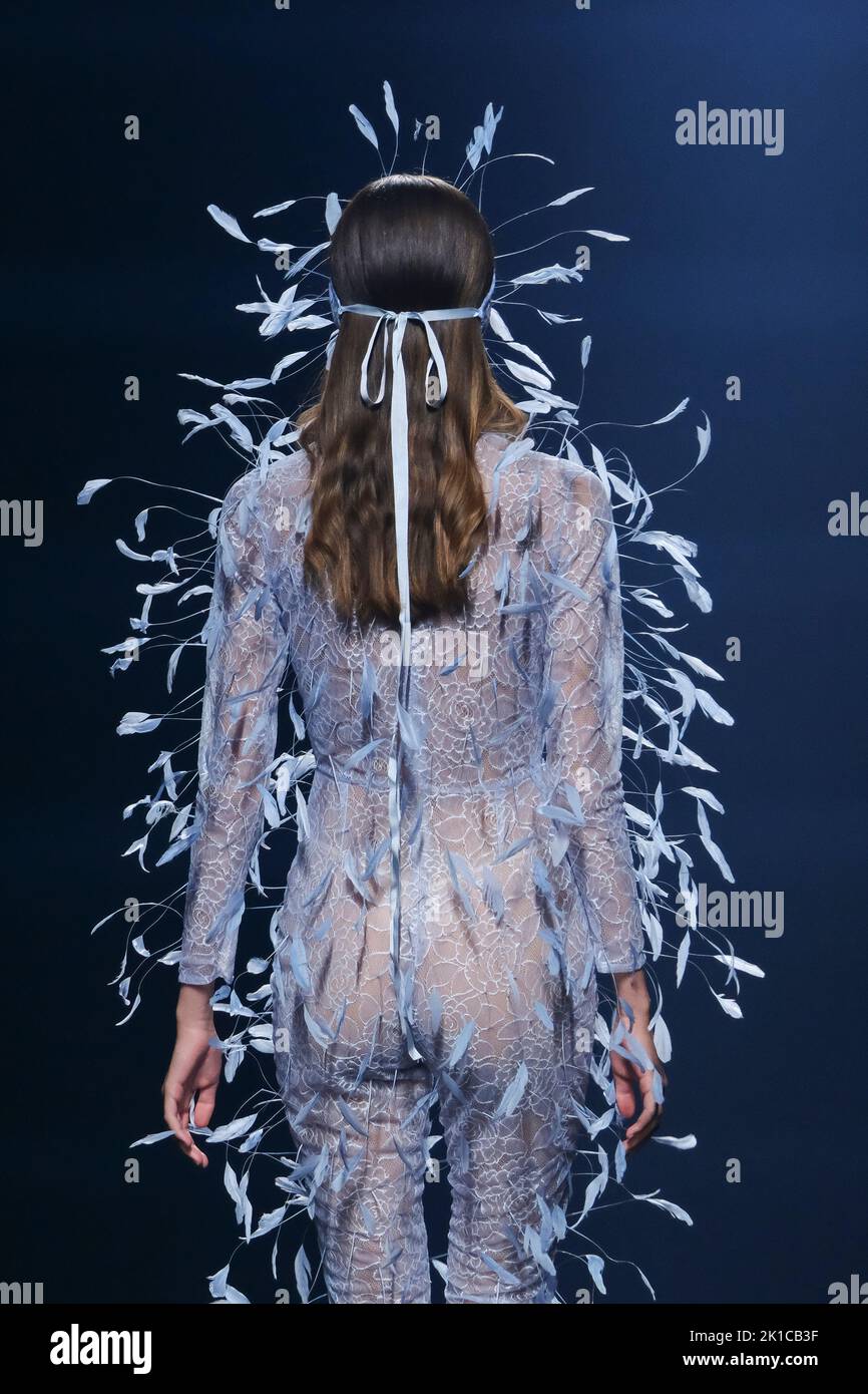 Madrid, Spain. 17th Sep, 2022. A model walks the runway wearing a ...