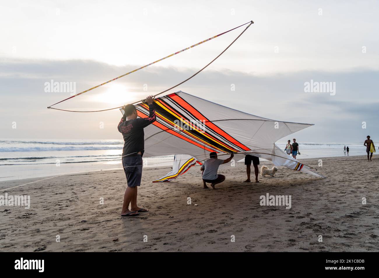 Bali, Indonesia. 17th Sep, 2022. Kite enthusiasts work together to ...