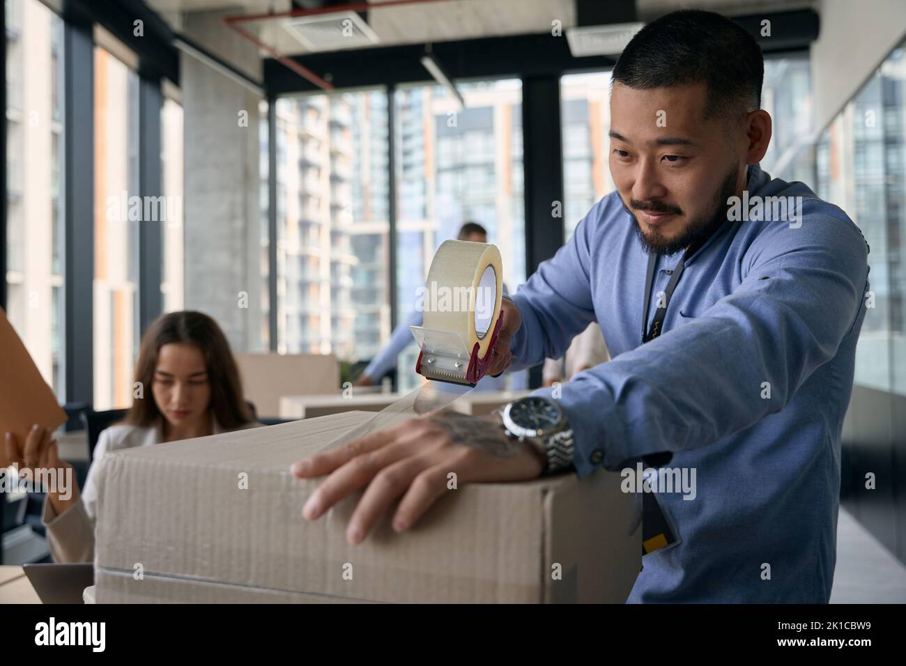 Corporate employee and his colleague preparing for office move Stock ...