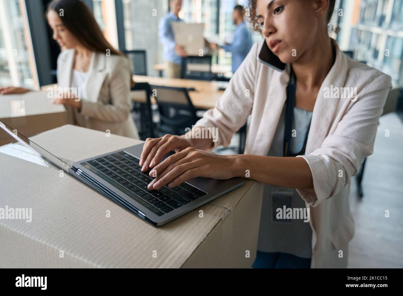 Group of company employees preparing for office move Stock Photo - Alamy