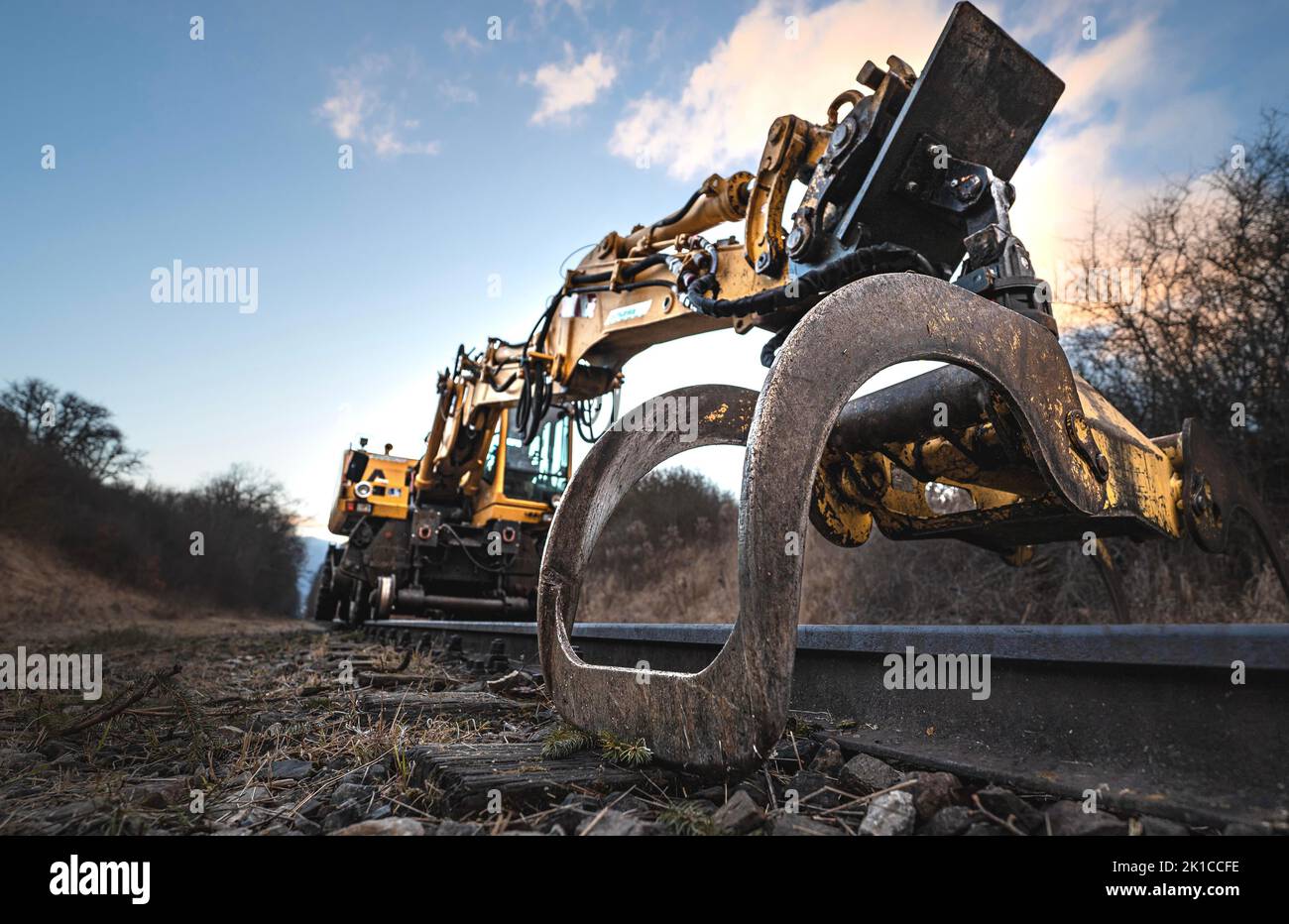 Rail excavator with grab arm in Althengstett, Germany Stock Photo - Alamy