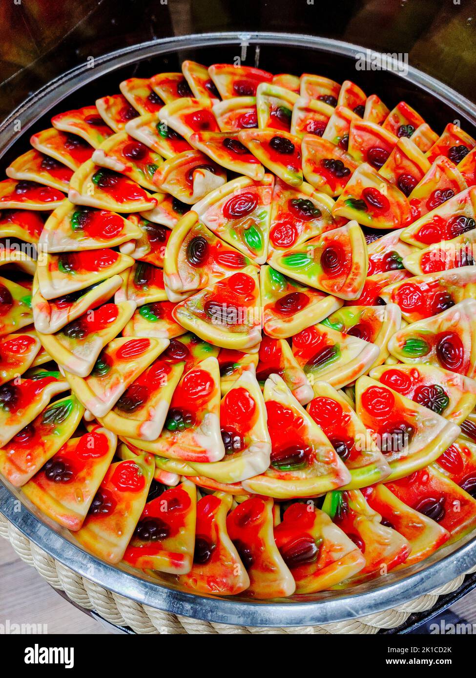 barrel full of pizza-shaped jelly beans Stock Photo - Alamy